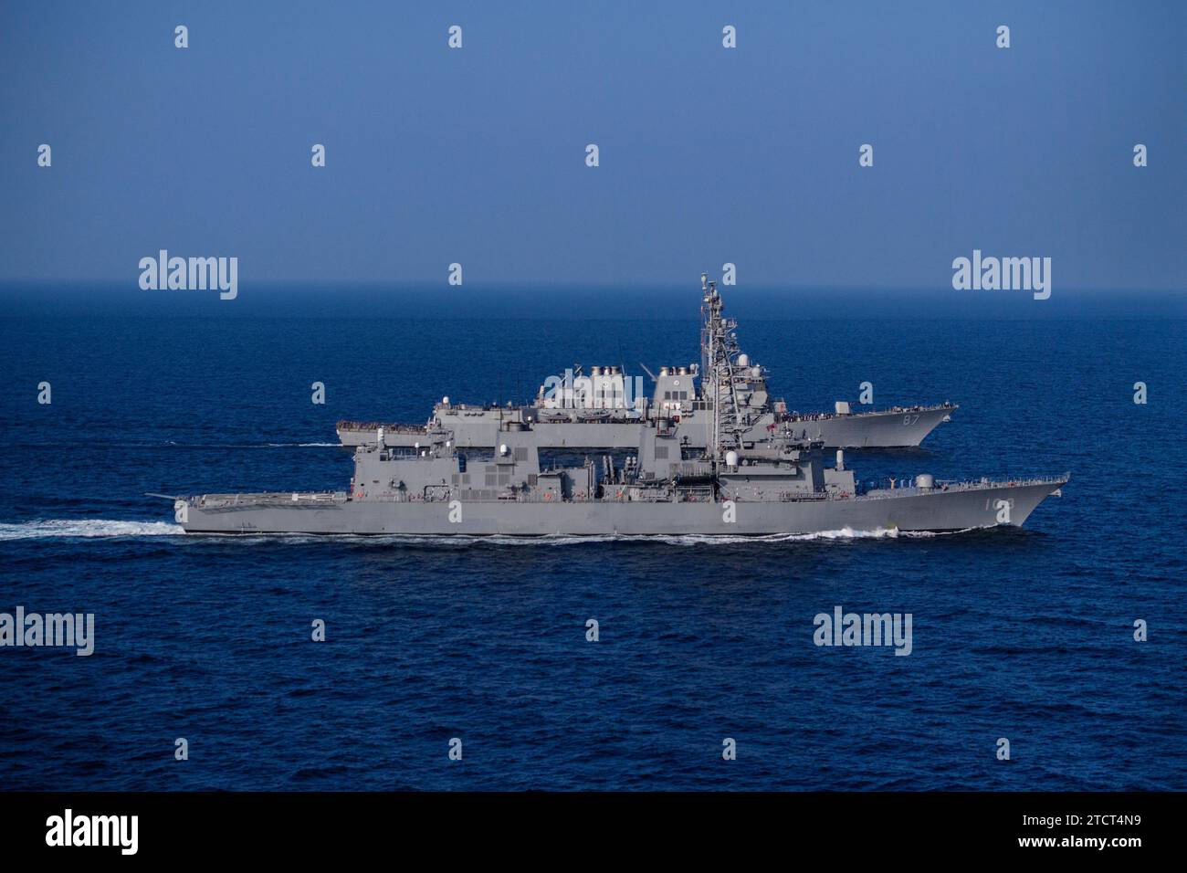 The guided-missile destroyer USS Mason (DDG 87) sails alongside the ...