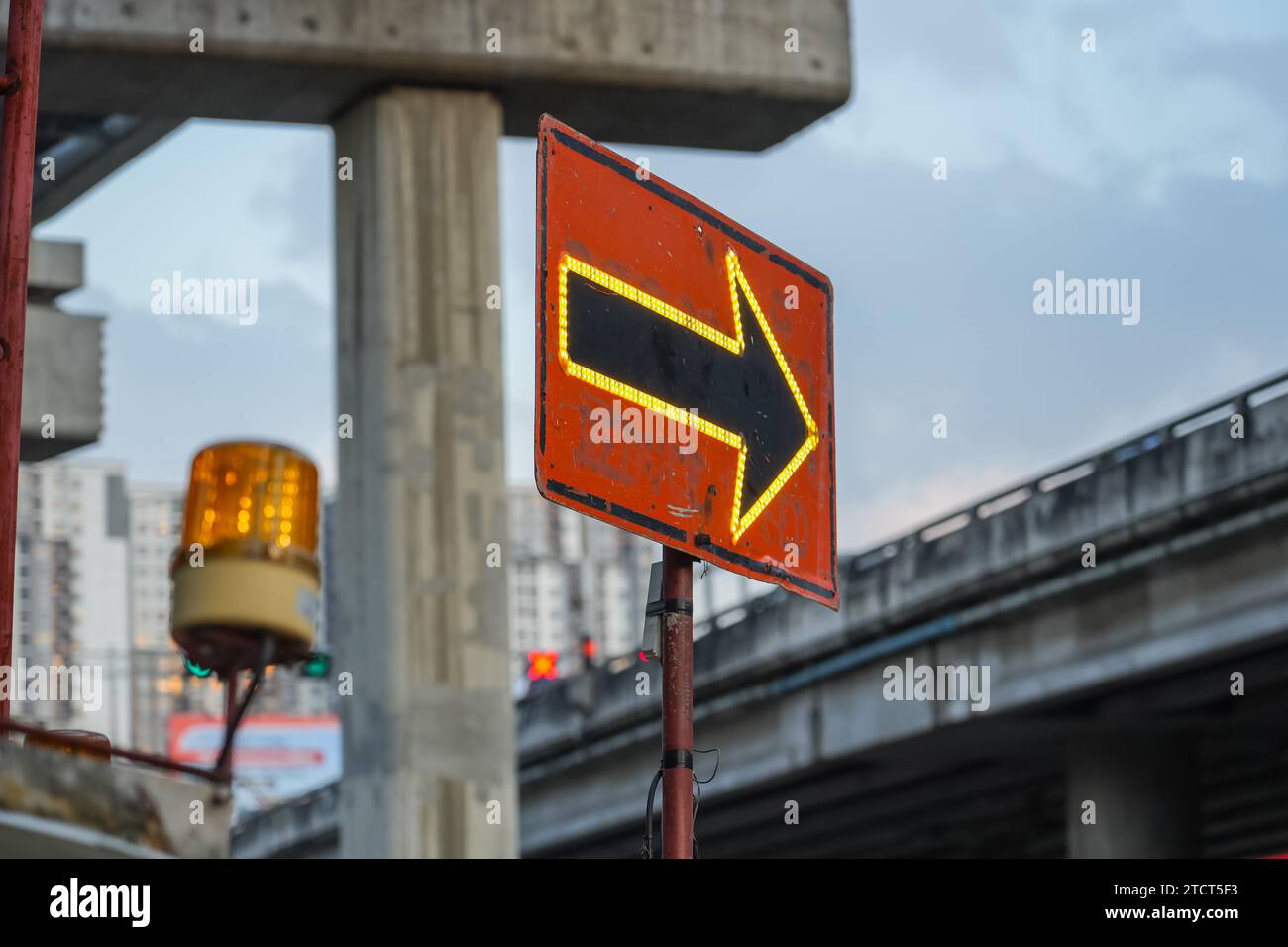 Traffic sign with flags reading utilitary. Electronic arrow pointing to ...