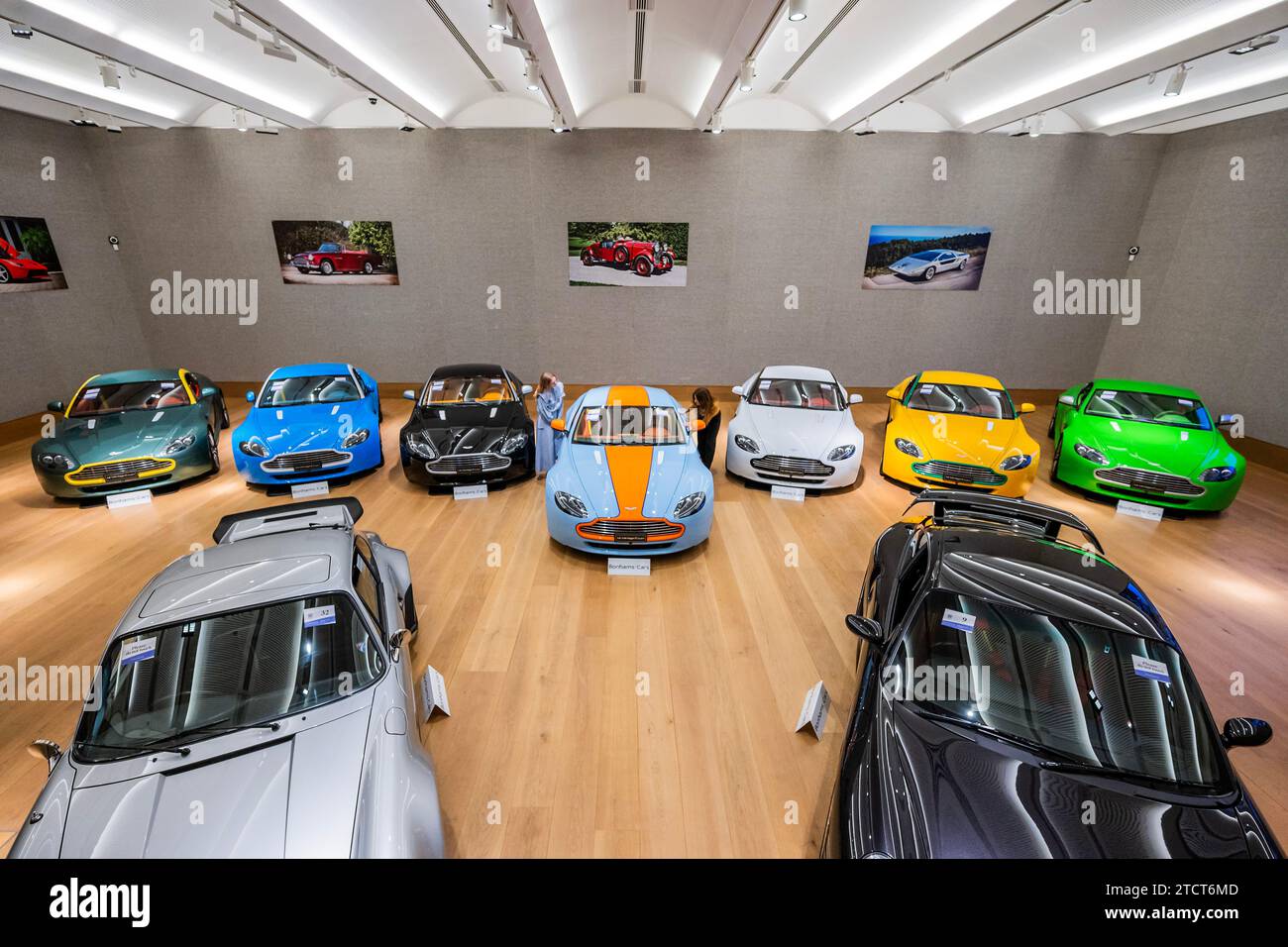 London, UK. 14th Dec, 2023. A room full of contemporary supercars ...