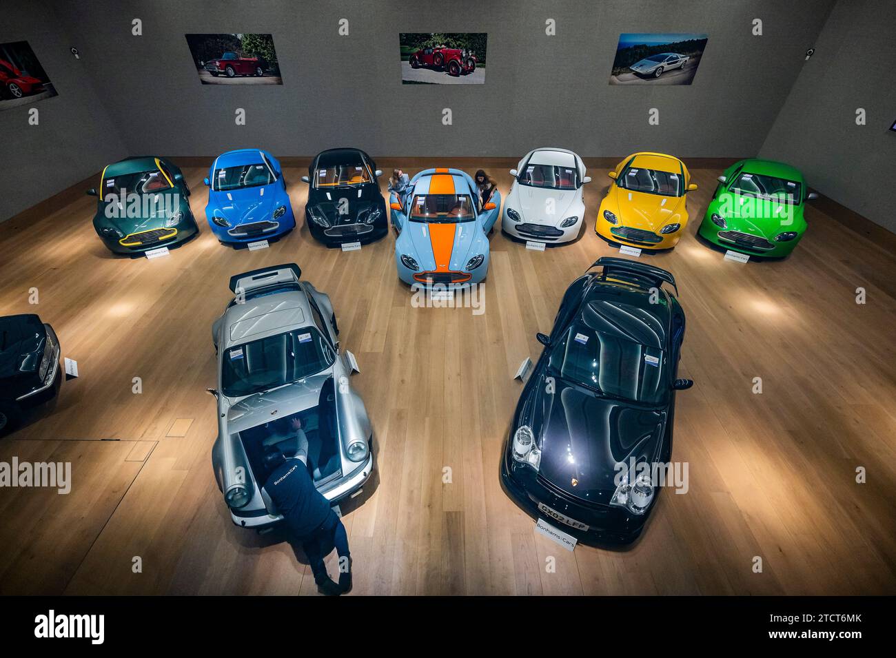 London, UK. 14th Dec, 2023. A room full of contemporary supercars ...
