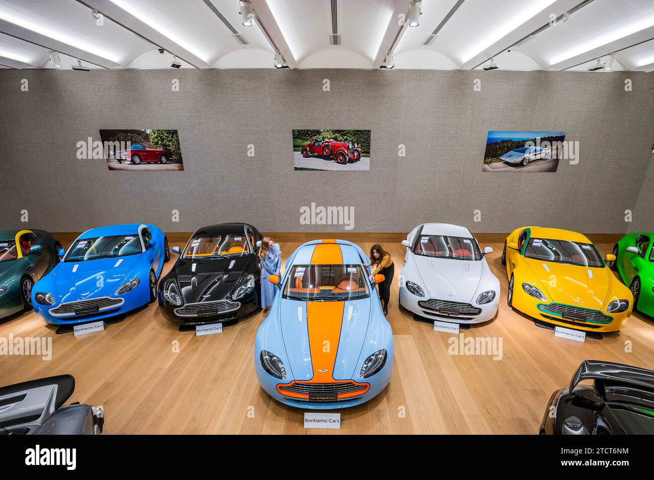 London, UK. 14th Dec, 2023. A room full of contemporary supercars ...