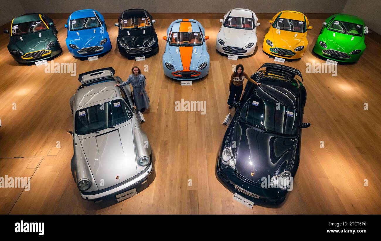 London, UK. 14th Dec, 2023. A room full of contemporary supercars ...