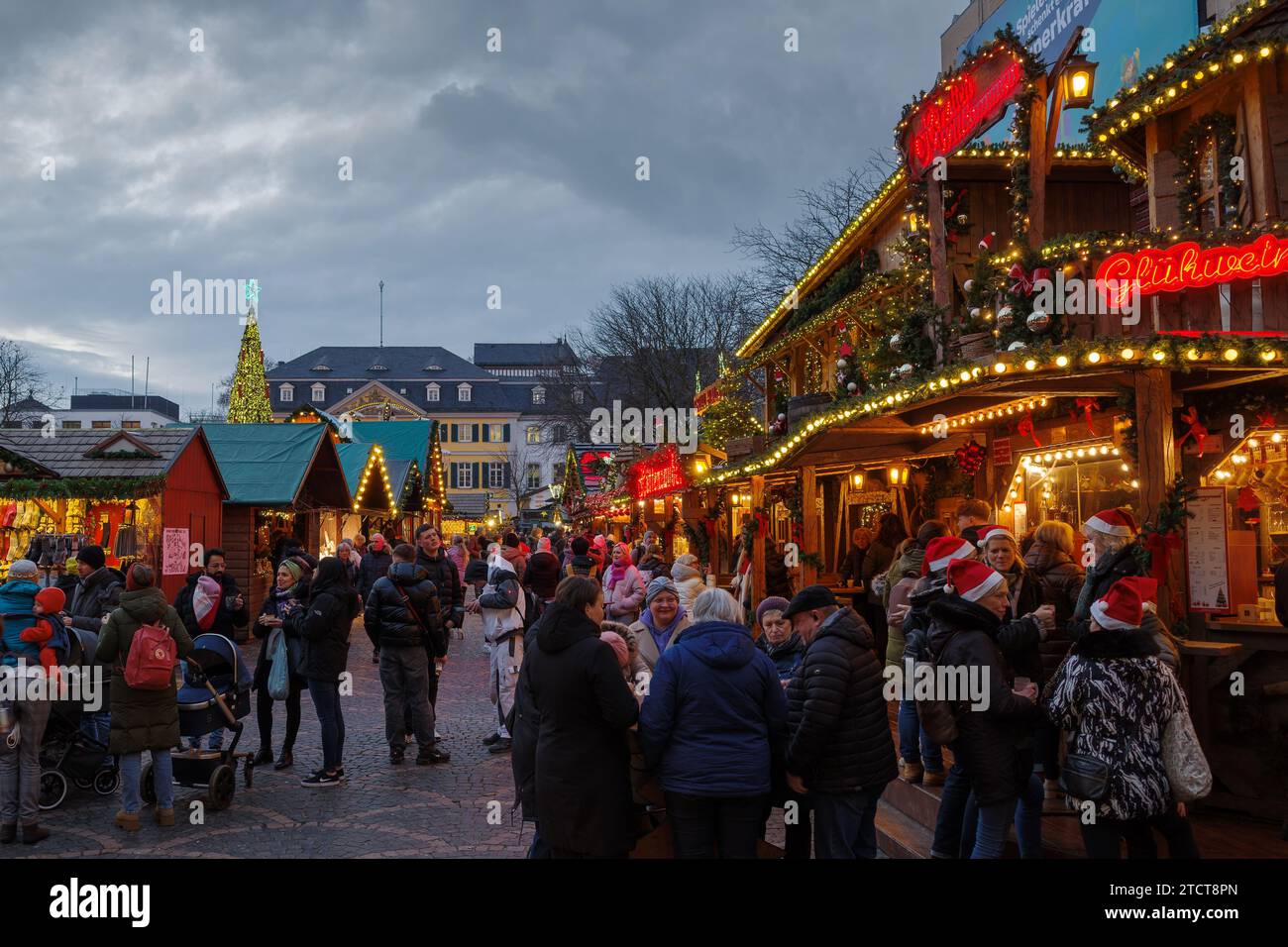 Bonn, Germany - Dec 6, 2023: Twilight view of a bustling Christmas ...