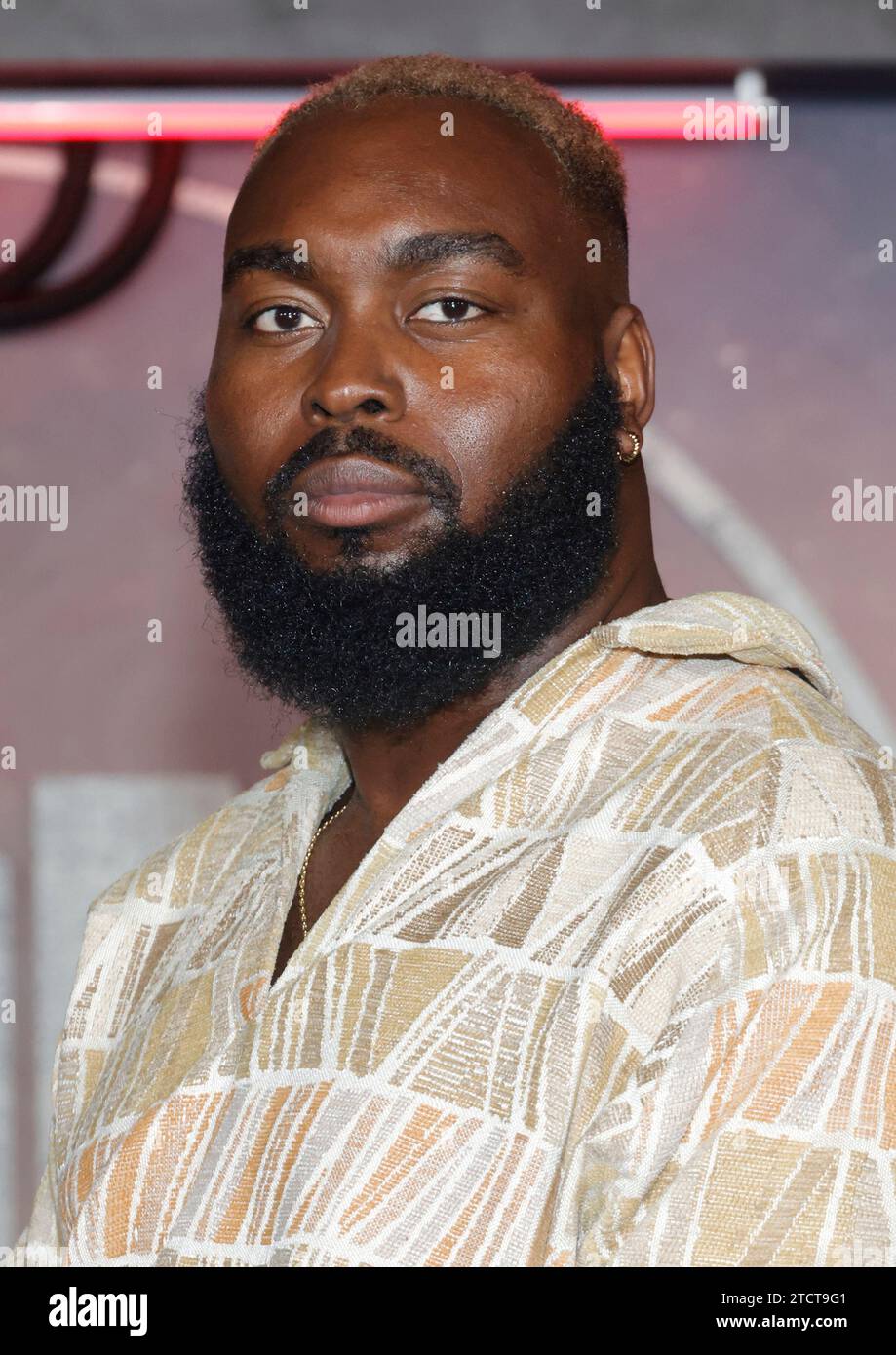 Hollywood, Ca. 13th Dec, 2023. Abraham Popoola at the LA Premiere of ...