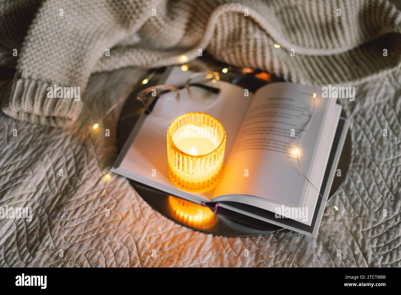 Candle light in a book hi-res stock photography and images - Alamy