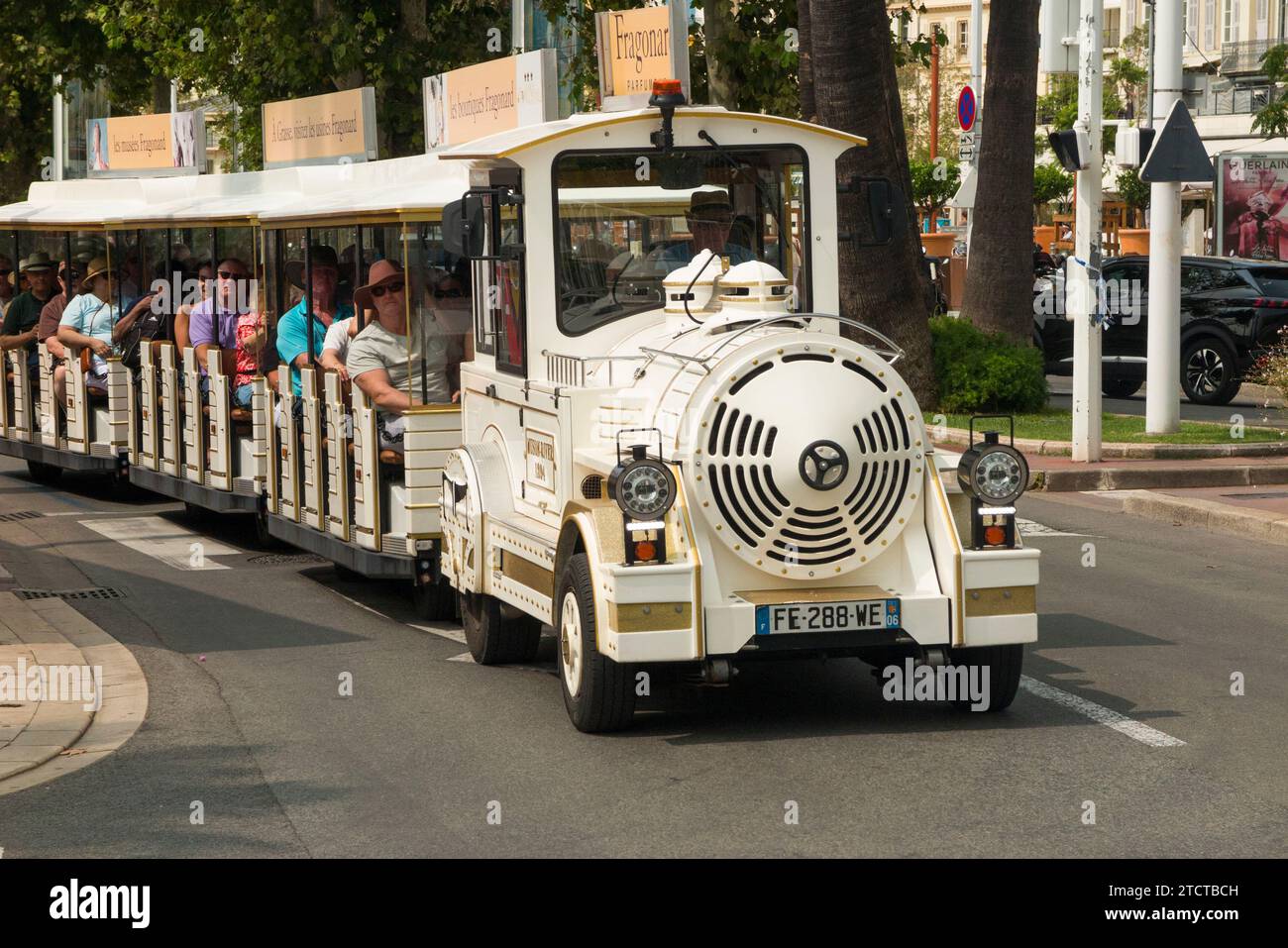 Tourist sightseeing train / trains with visitors enjoying tour of ...