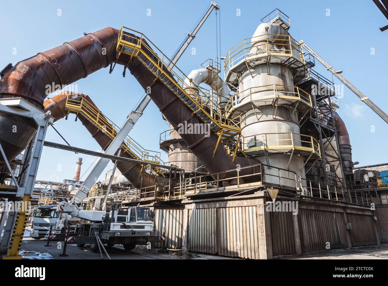 Cranes during assembly of the installation in the smelter Stock Photo ...
