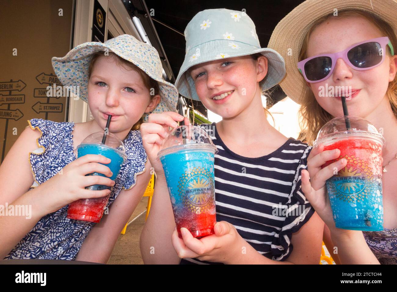 Three Girls Drink Fresh Slushi Cool Cooling Frozen Ice Drink Ice Cream Refreshing Brand Of