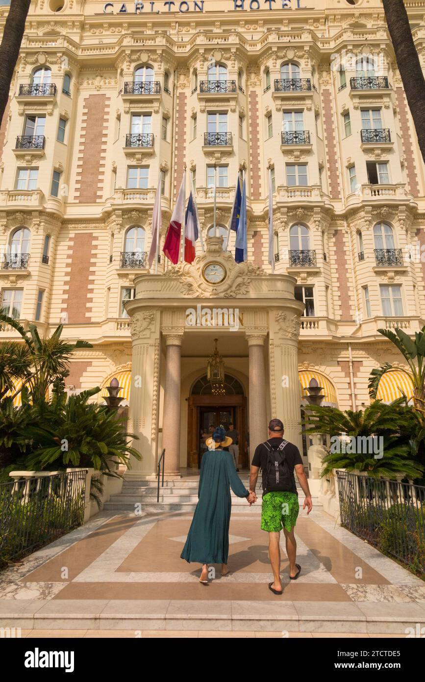 Exterior front facade and elaborate entrance doorway with Rolex clock ...