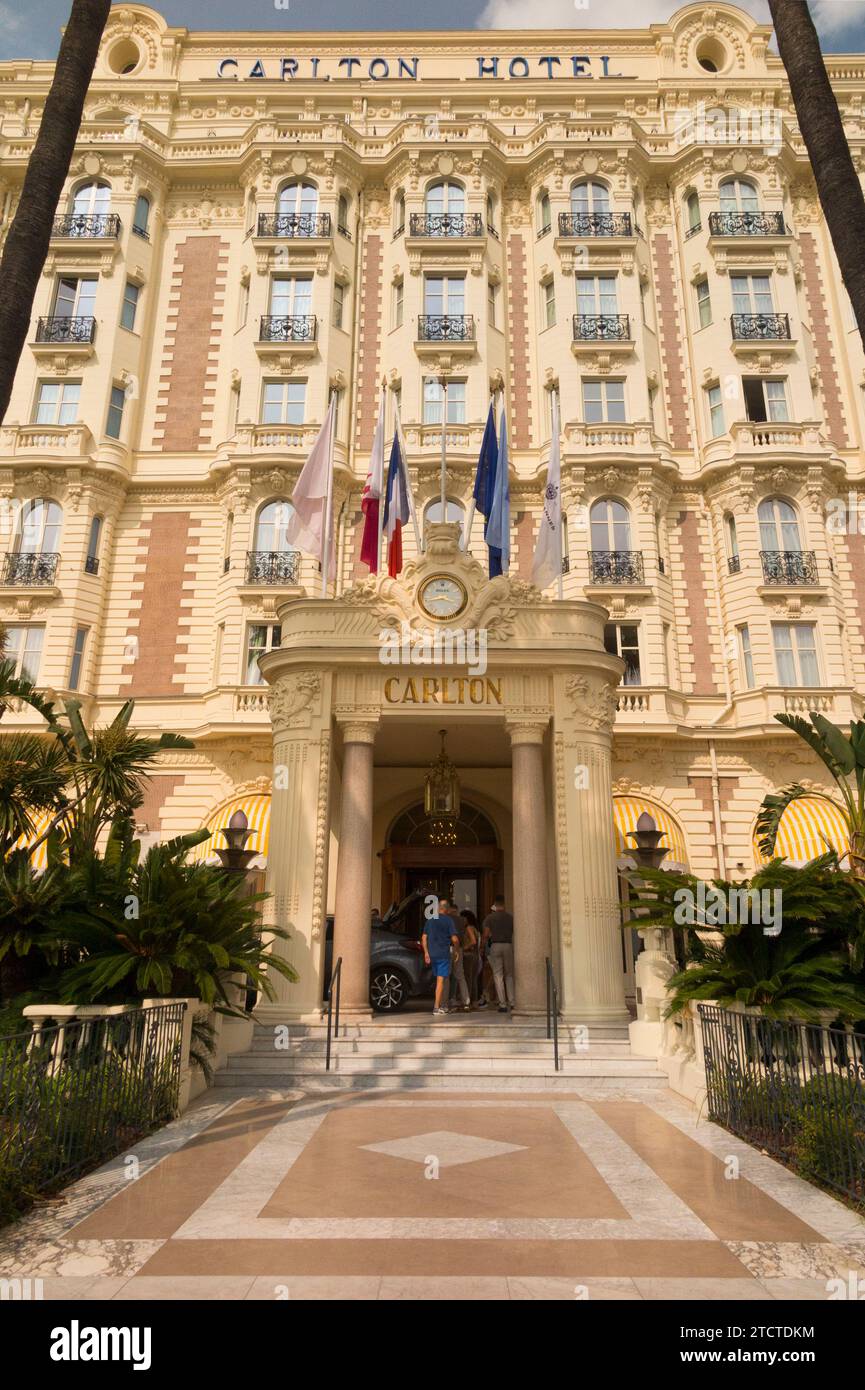 Exterior front facade and elaborate entrance doorway with Rolex clock ...