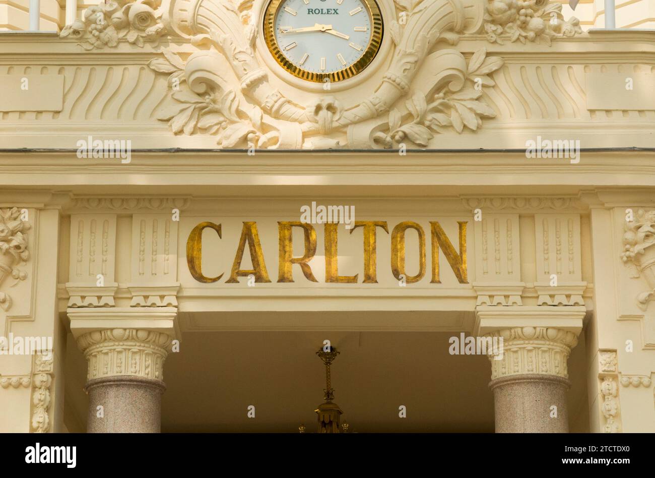 Exterior front facade and elaborate entrance doorway with Rolex clock ...