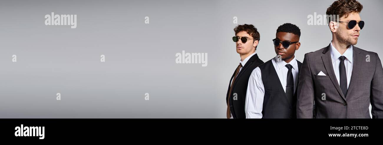 handsome diverse man in elegant smart suits with sunglasses posing on ...
