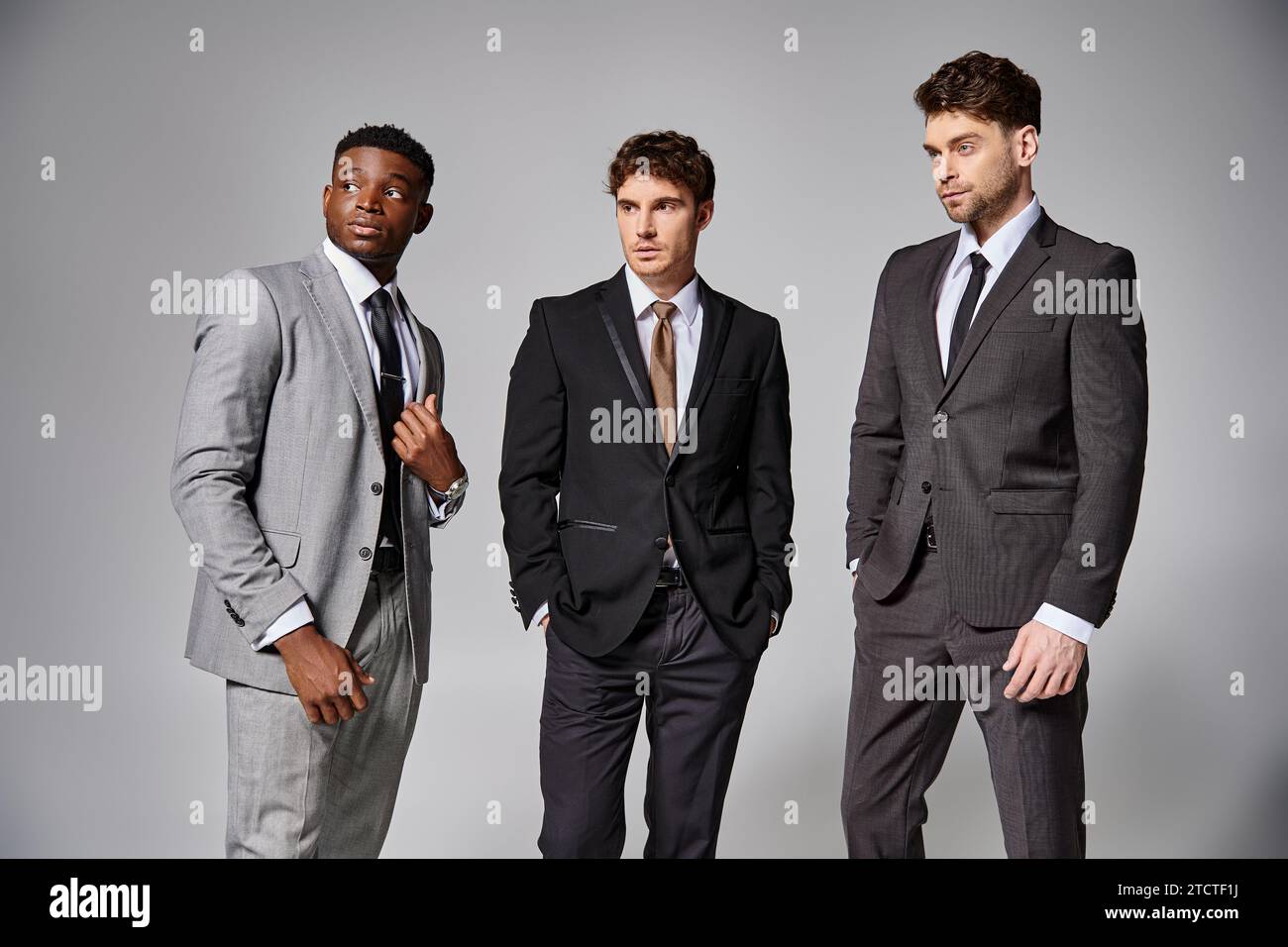 handsome stylish diverse male models in business elegant smart suits ...