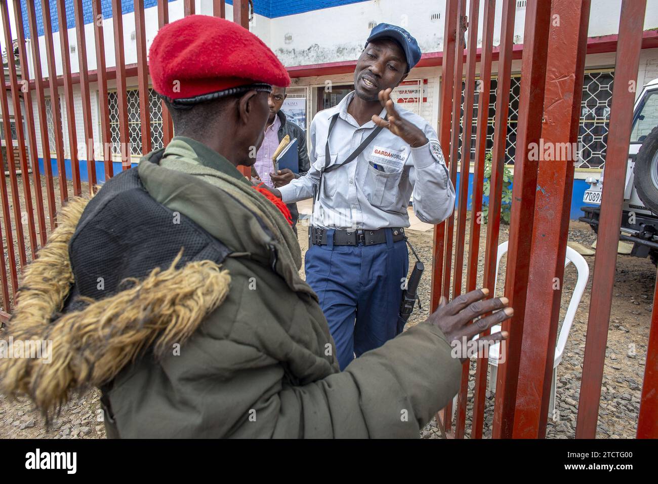Policeman and security guard in Bukavu, DRC Stock Photo - Alamy
