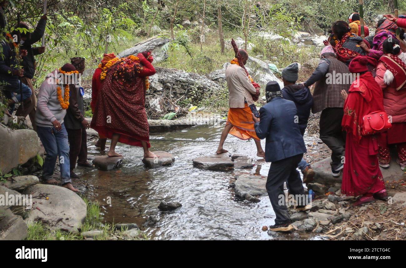 Dhading, Bagmati, Nepal. 14th Dec, 2023. Devotees offer prayers to the ...