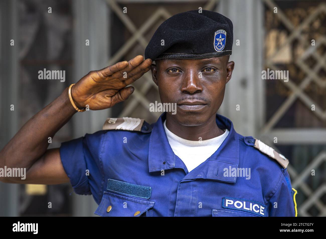 Policeman saluting in Bukavu, DRC Stock Photo - Alamy