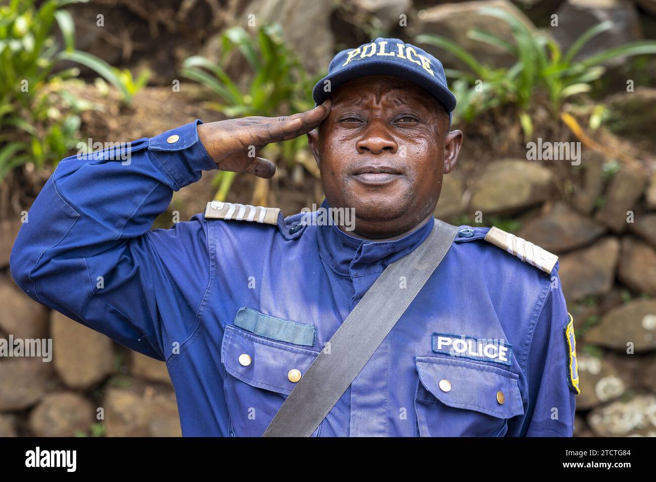 Policeman saluting in Bukavu, DRC Stock Photo - Alamy