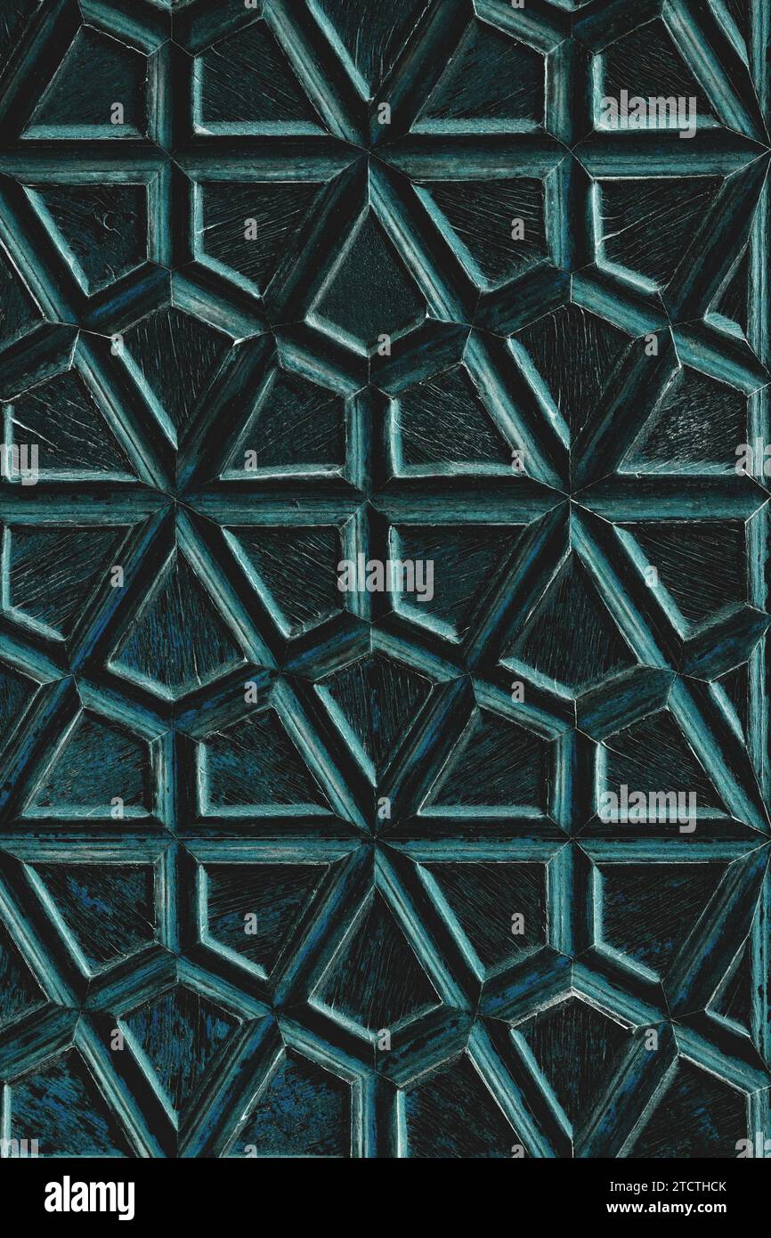 Wooden panel detail with islamic style geomtric pattern carvings ...
