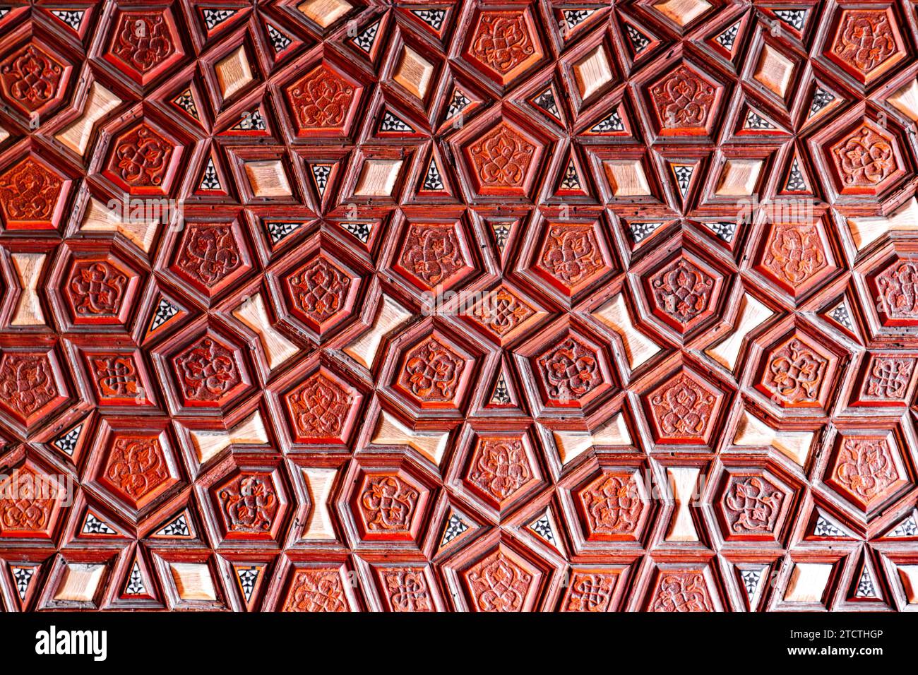 Wooden panel detail with islamic style geomtric pattern carvings ...