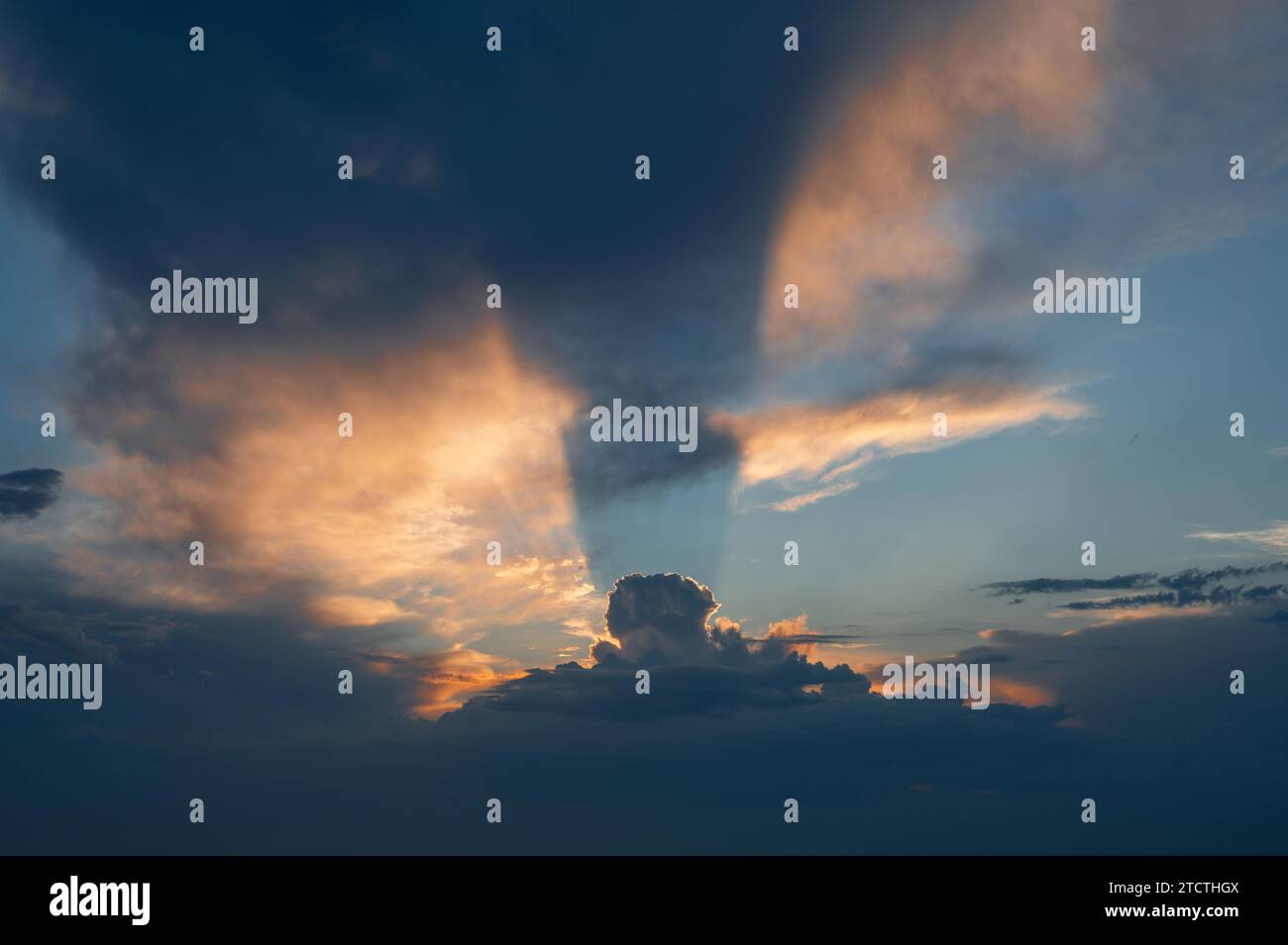 Beautiful sunset sky above with interesting shadow on the clouds from ...