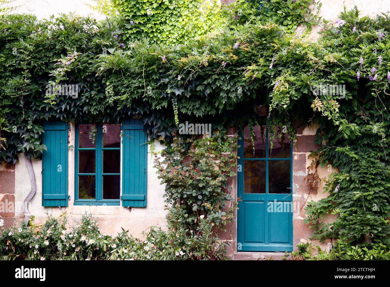 Typical french house with flowers in the country. France Stock Photo ...