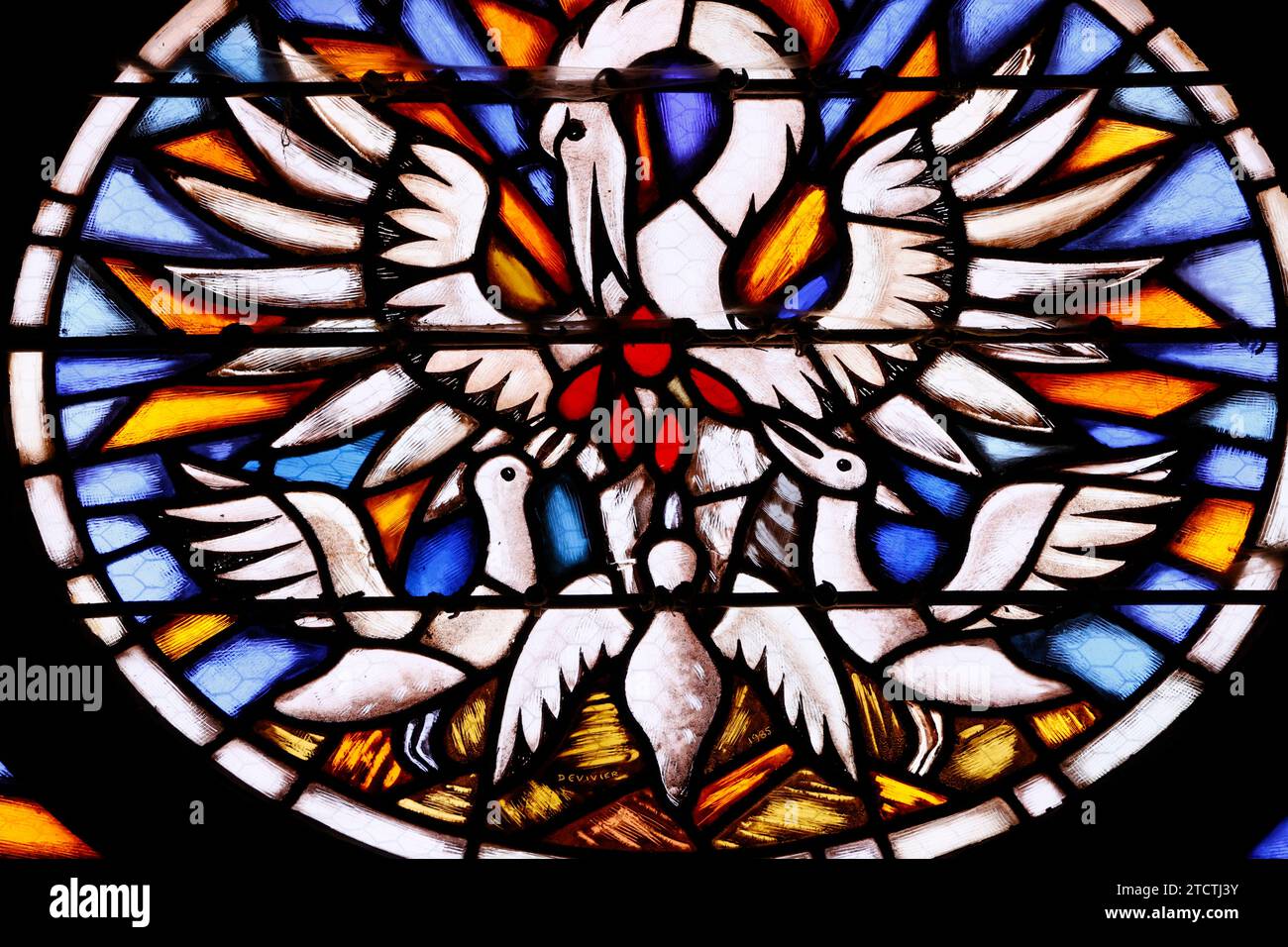 Saint Leonard church. Stained glass. Mother pelican feeding her little ...