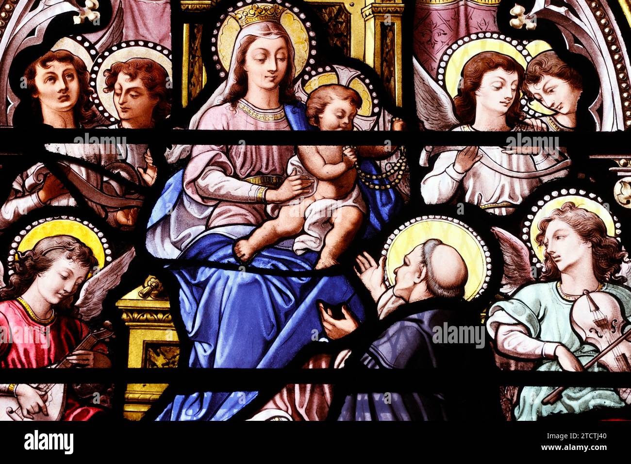 Saint Leonard church. Stained glass. Saint Dominic receiving the Rosary ...