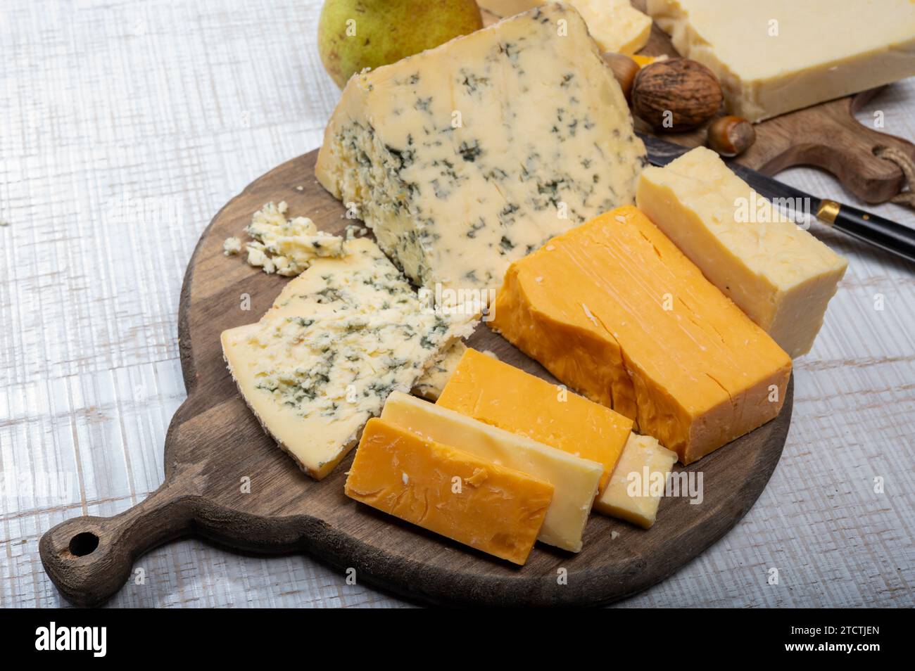 English cheeses collection, mature and coloured cheddar cheese and semi ...