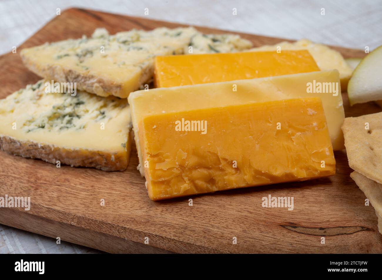 English cheeses collection, mature and coloured cheddar cheese and semi ...