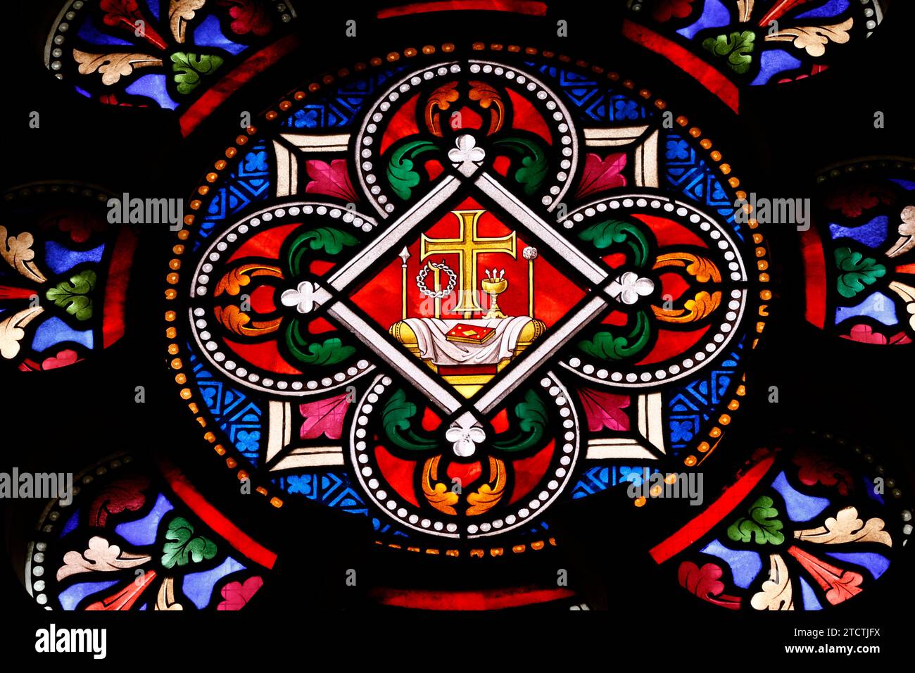 Saint Aubin church. Stained glass. Symbols of the passion of Jesus ...