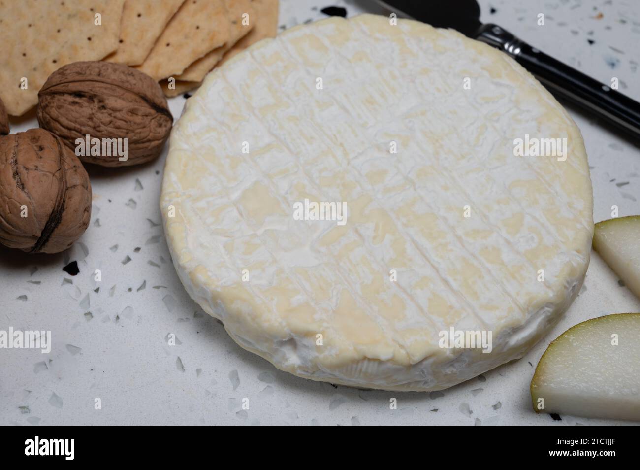 French soft Cremeux de Normandie cheese, soft creamy cheese with white ...