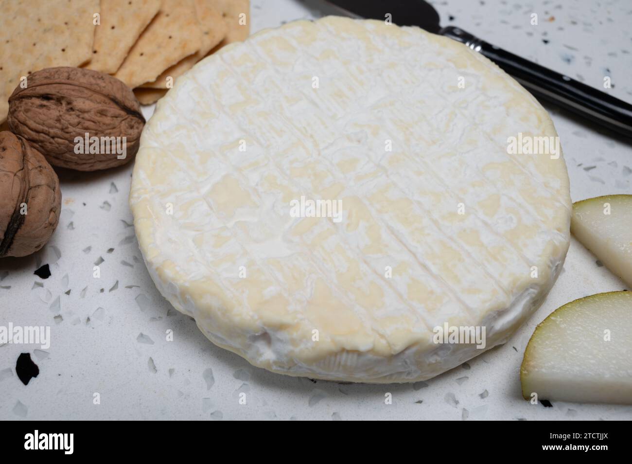 French soft Cremeux de Normandie cheese, soft creamy cheese with white ...