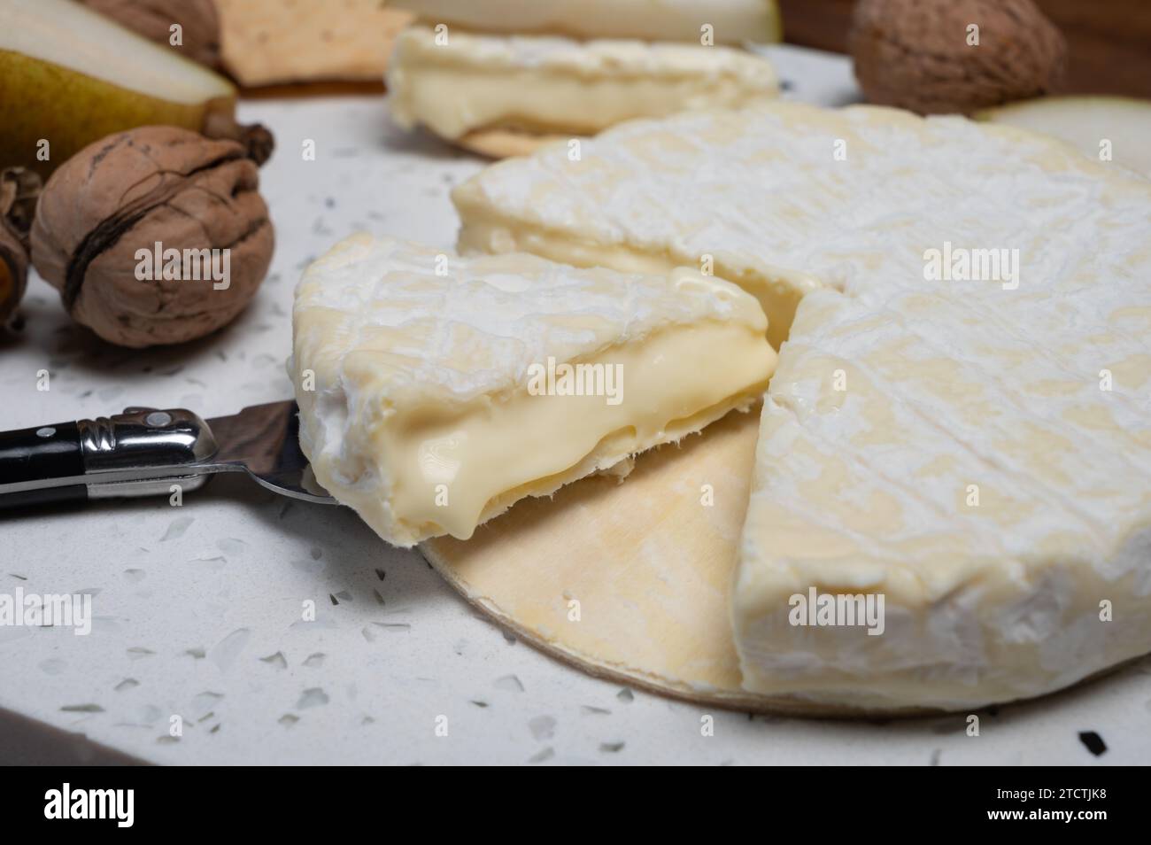 French soft Cremeux de Normandie cheese, soft creamy cheese with white ...