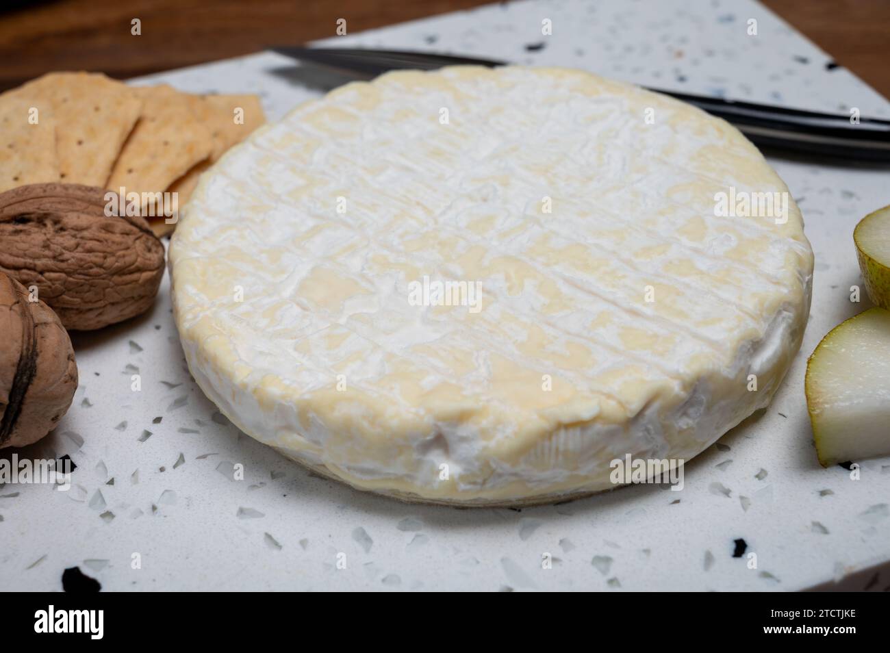 French soft Cremeux de Normandie cheese, soft creamy cheese with white ...