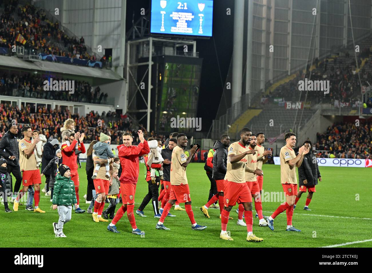 players of Lens celebrate after winning the Uefa Champions League ...