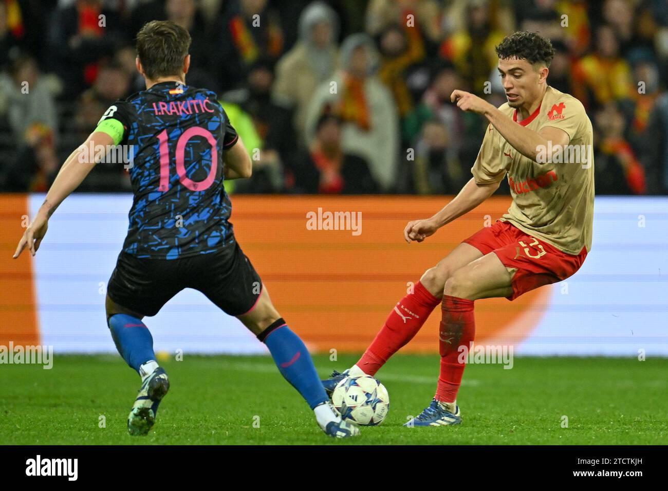 Ivan Rakitic (10) of Sevilla defending on Neil El Aynaoui (23) of RC ...