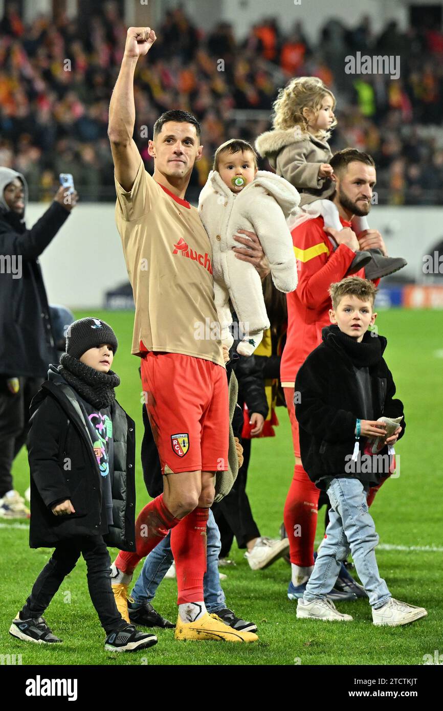 players of Lens with Florian Sotoca (7) of RC Lens celebrate after ...