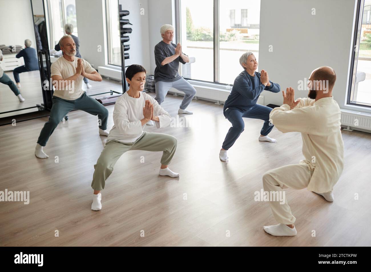 Elderly People Practicing Prayer Pose Stock Photo - Alamy