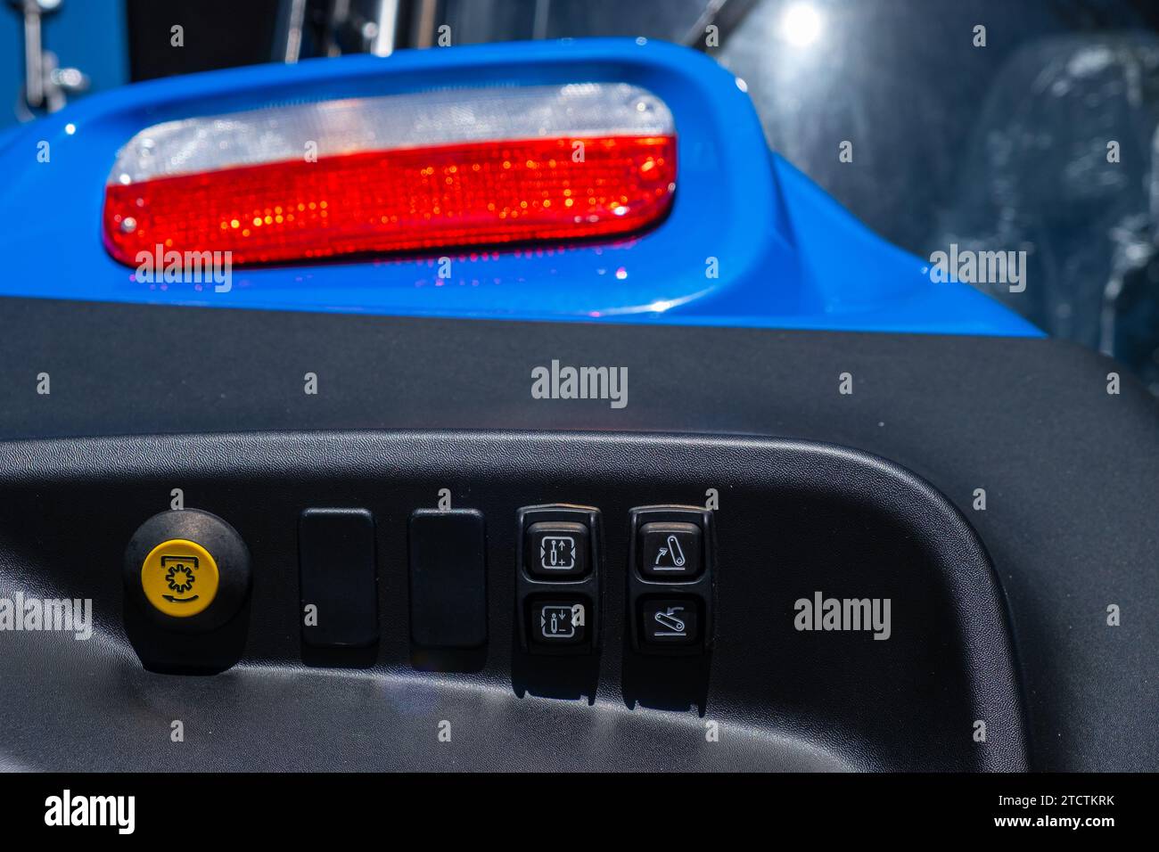 selective focus, control buttons on the rear of a tractor Stock Photo ...