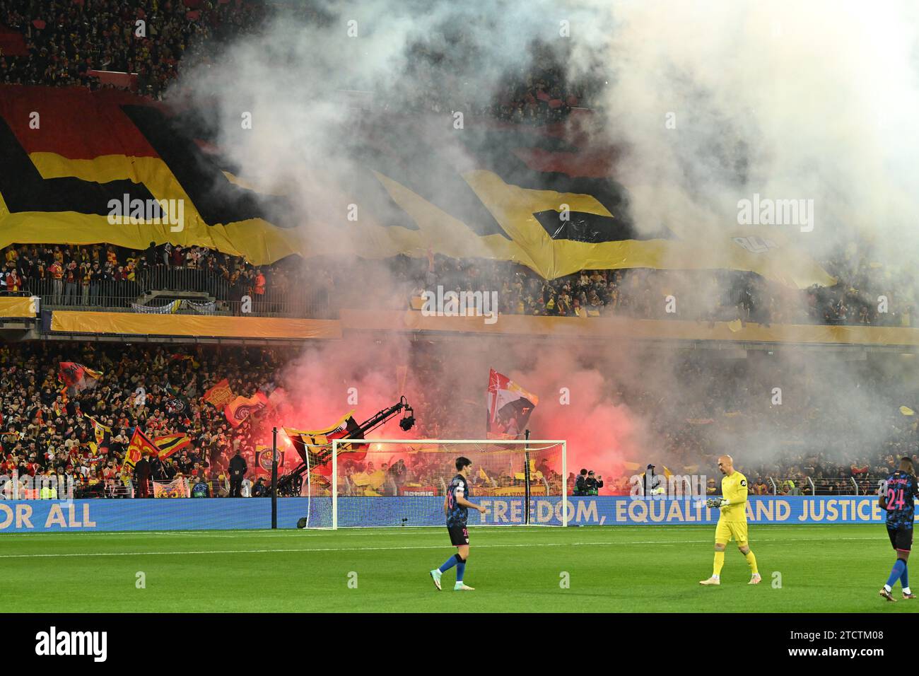 fans and supporters of Lens using pyrotechnical flares and fireworks ...