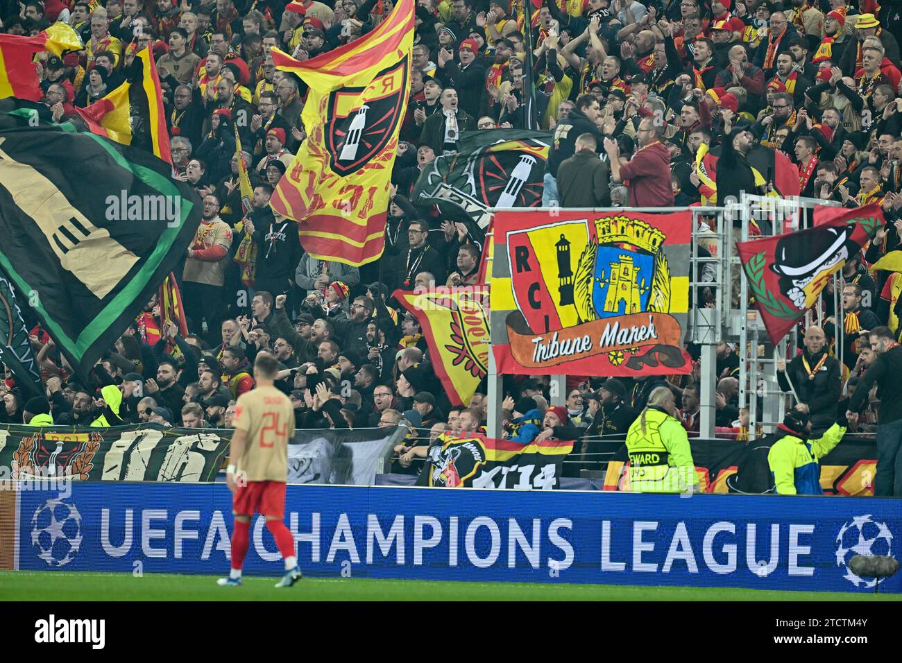 fans and supporters of Lens pictured with the Champions League banner ...