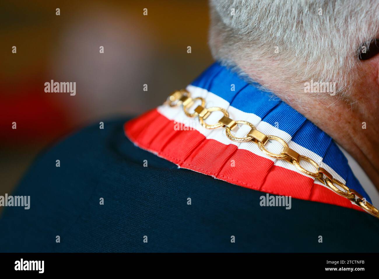 The tricolor sash of the mayor. Symbol of french republic. Saint ...