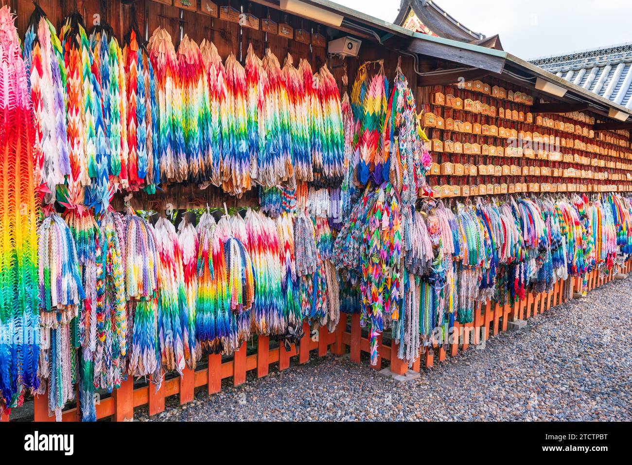 Kyoto, Japan Thousand folded paper cranes and ema votive pictures in ...
