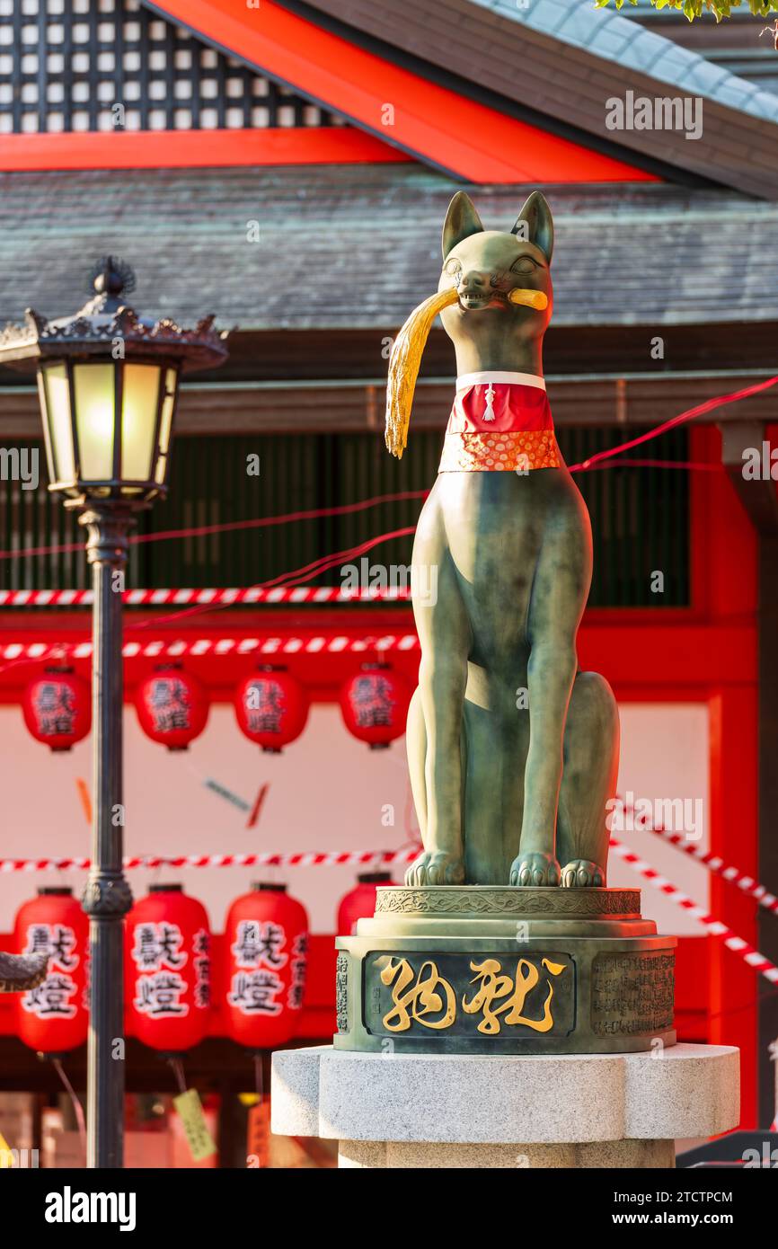 Kyoto, Japan Fox statue with Japanese traditional red lanterns at ...