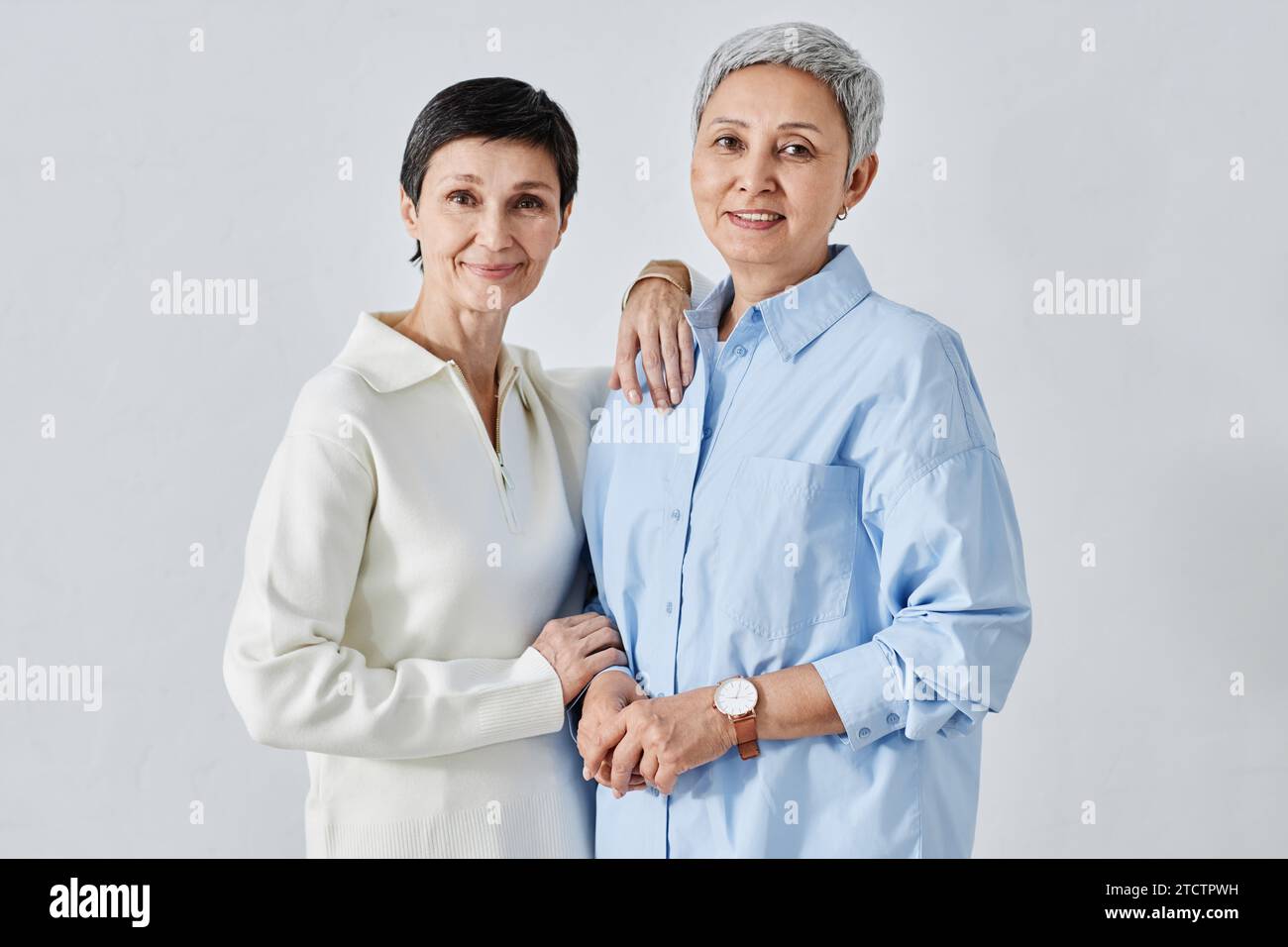 Two Senior Women Smiling at Camera Stock Photo - Alamy