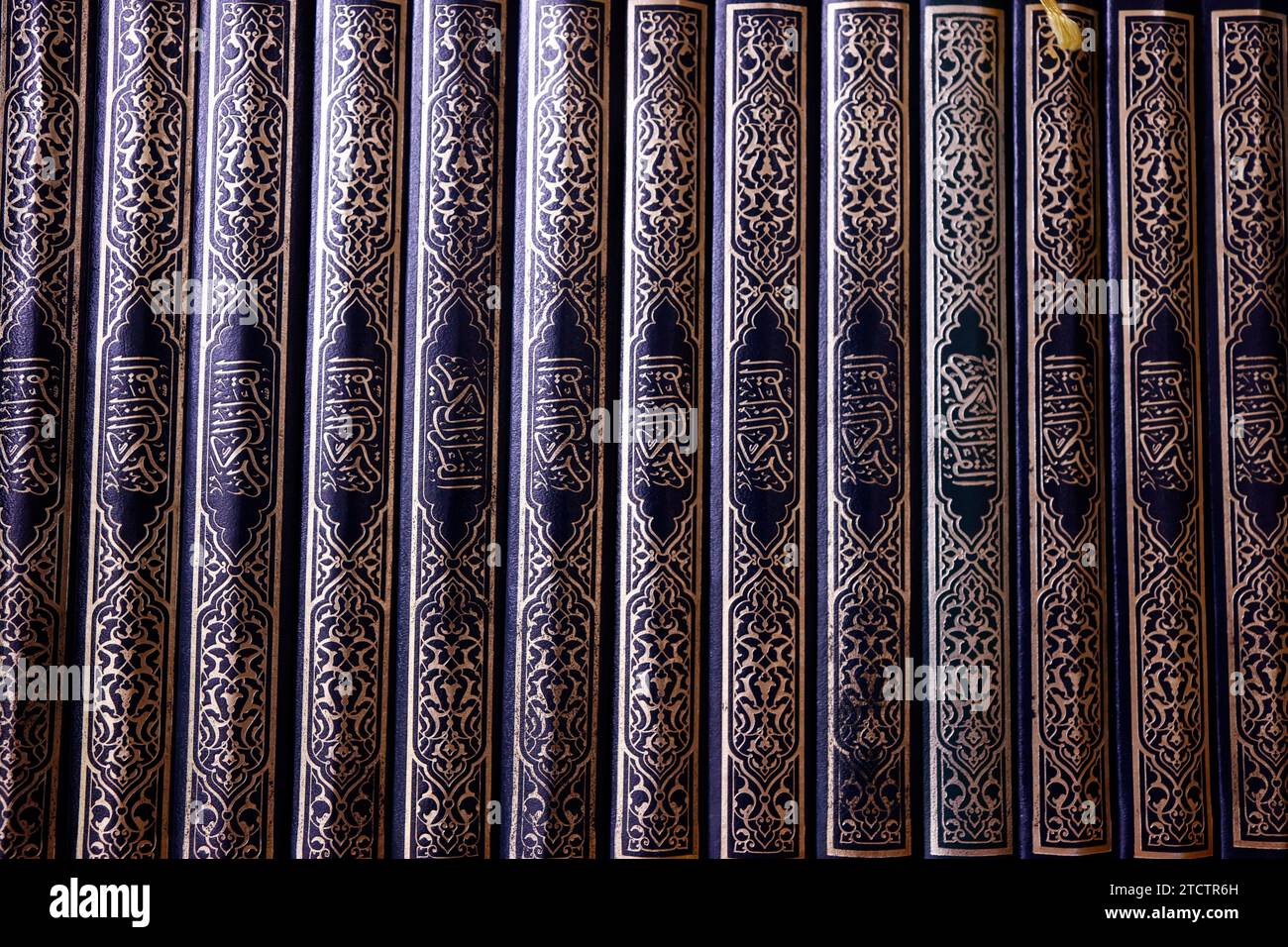 Row of Holy Quran ( Kuran ) books in a mosque. Islamic symbol. Phnom ...