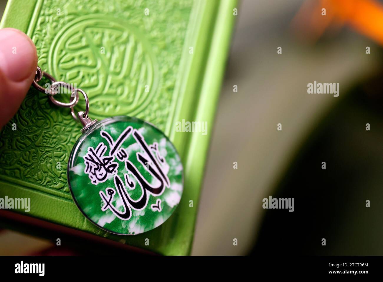 The Quran, holy book of Muslims from God with Allah monogram. Symbols ...