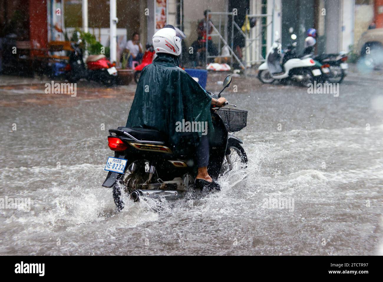 Season Monsoon. Heavy rain and water logging on road. Motor bike Stock ...