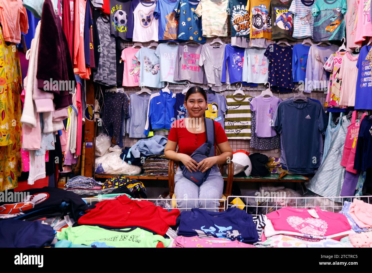Woman selling clothes hi-res stock photography and images - Alamy