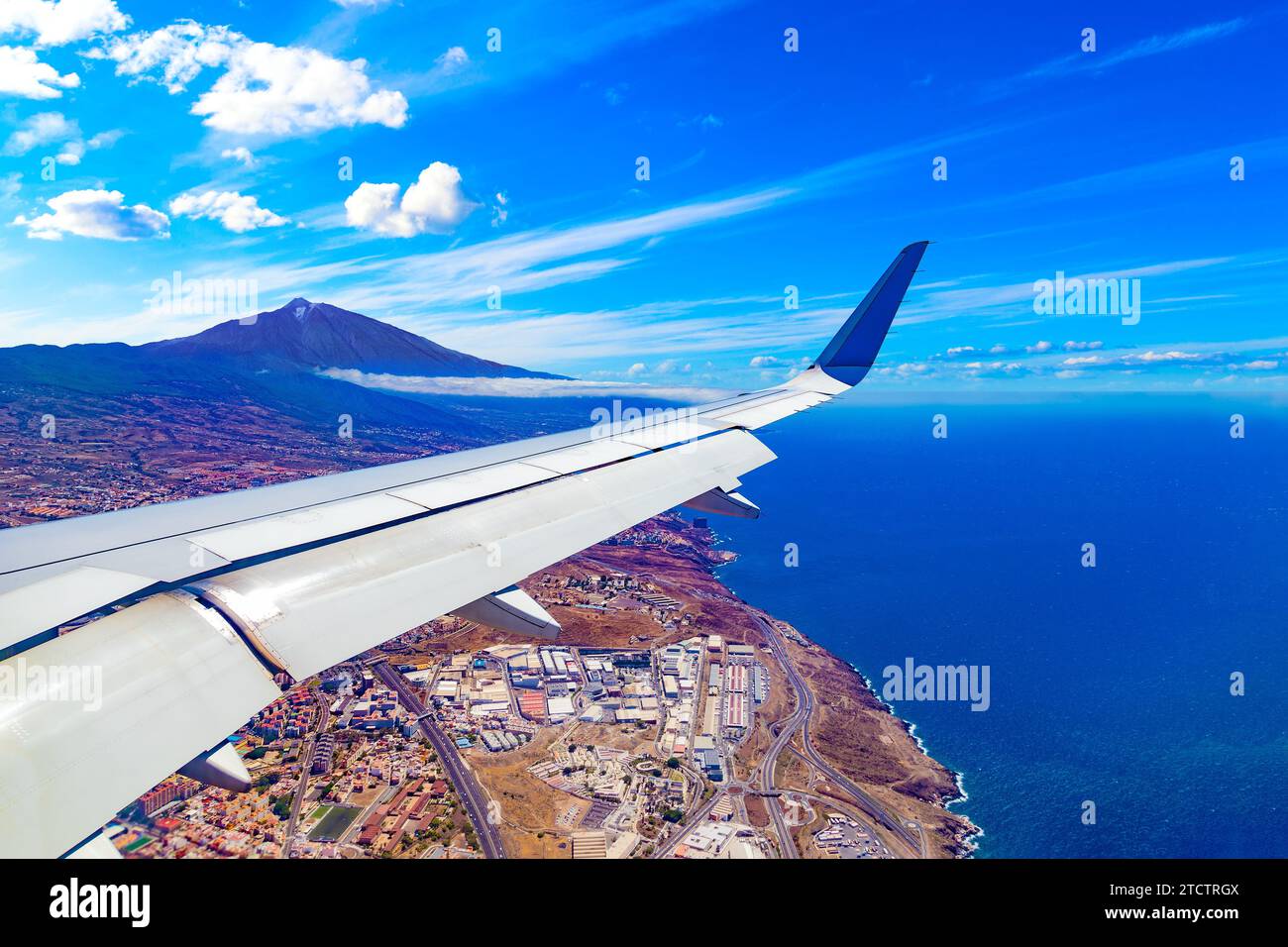 Aerial view of the sky over the mountains and the peak of the Teide ...